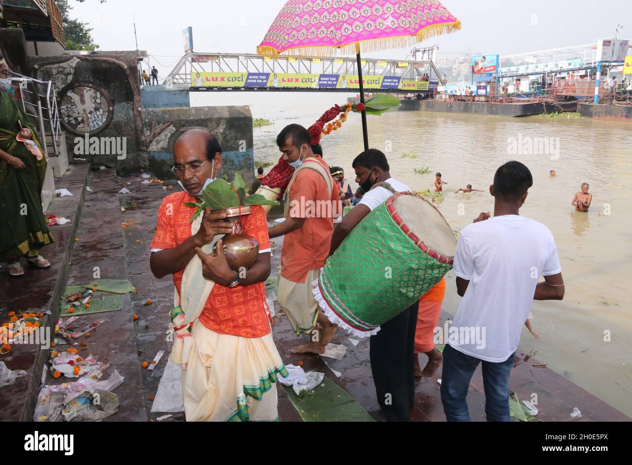 Kolkata, India. 12th Oct, 2021. Indian Hindu holy men or sadhus perform ...