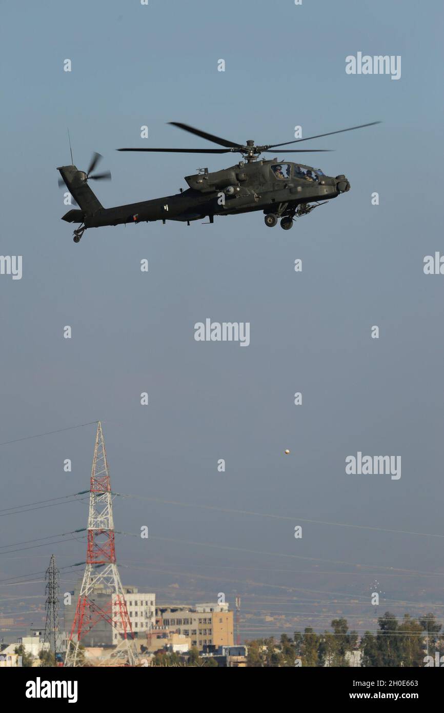 An AH-64 Apache helicopter, operated by Soldiers with 4-4th Attack ...