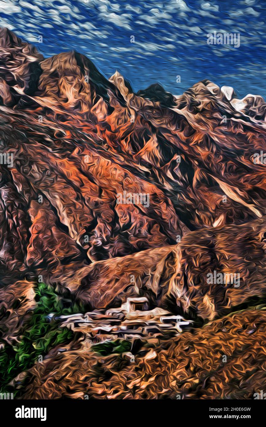 Small village at the bottom of mountains and rocky valleys at the ...