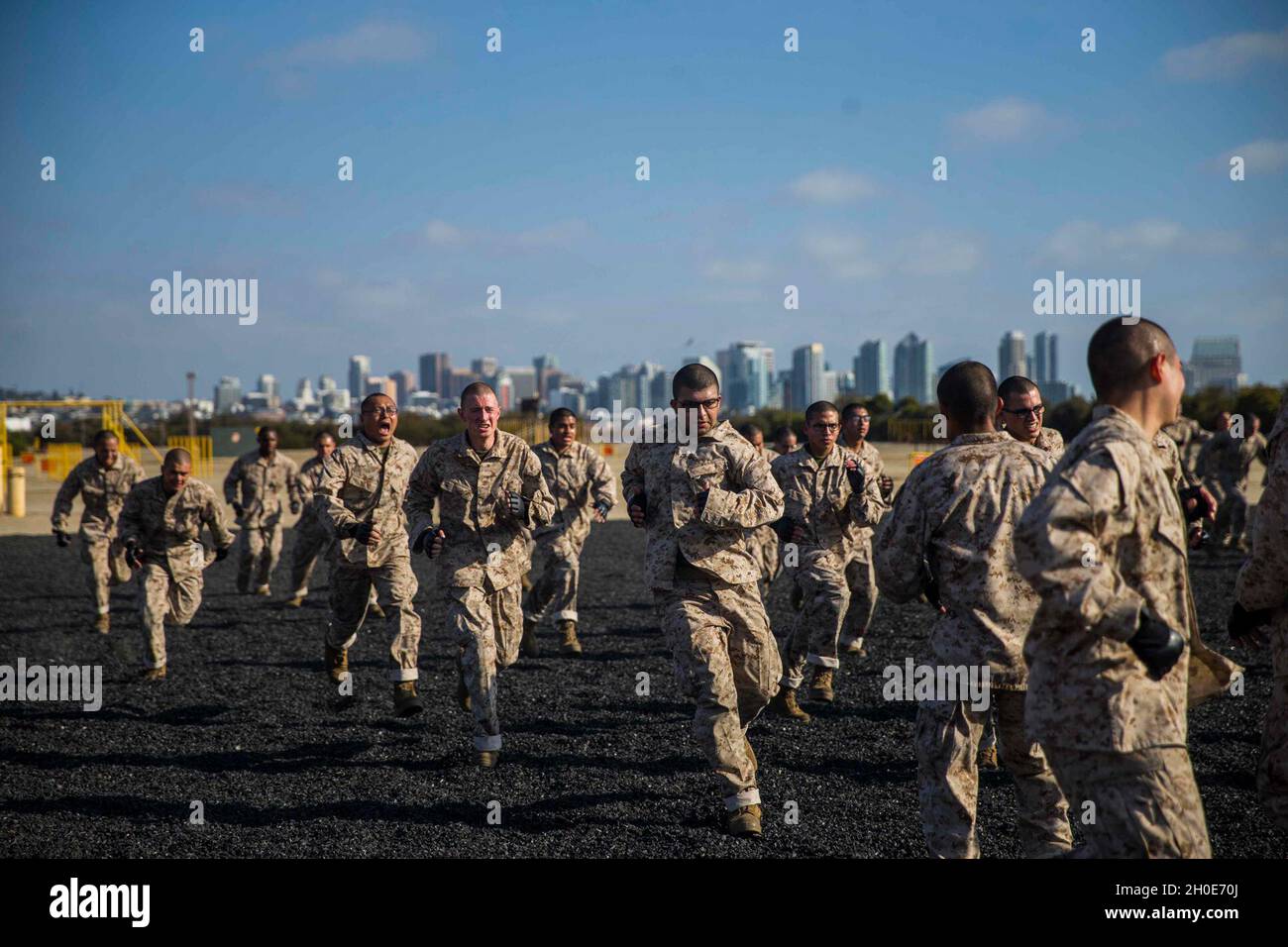 Recruits with Kilo Company, 3rd Recruit Training Battalion, warm up ...