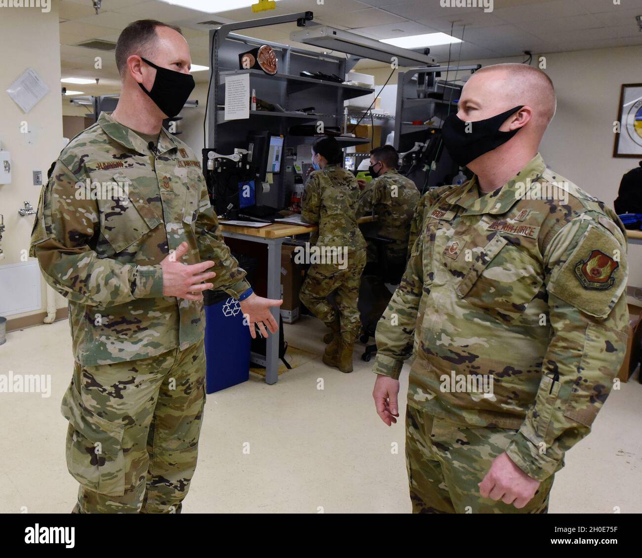 U.S. Air Force Senior Master Sgt. Bruce Haskin, left, an 88th Medical ...