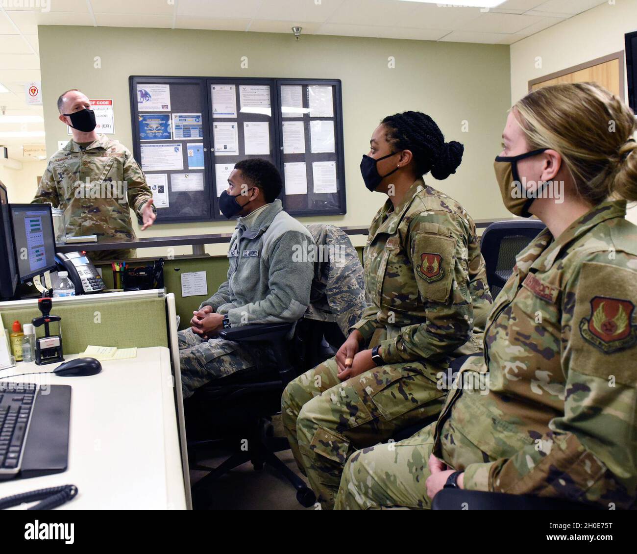 U.S. Air Force Senior Master Sgt. Bruce Haskin, left, a superintendent ...