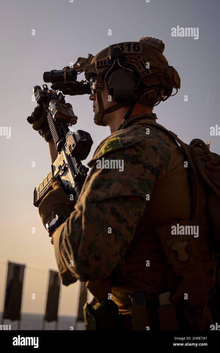 U.S. Marine Corps Cpl. Derek Wiley, a reconnaissance Marine with Force Reconnaissance Platoon ...