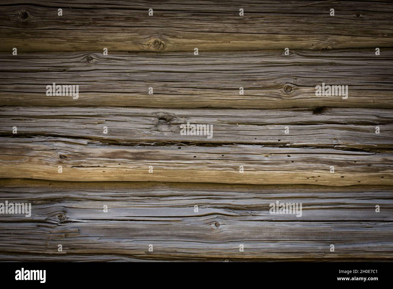 Wooden logs of an old house. Close-up. Weathered natural gray wood ...