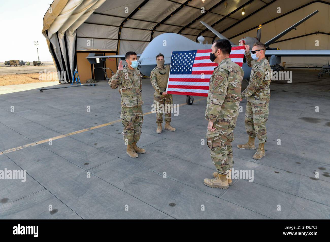 A servicemember from the 332 Air Expeditionary Wing Force Protection ...
