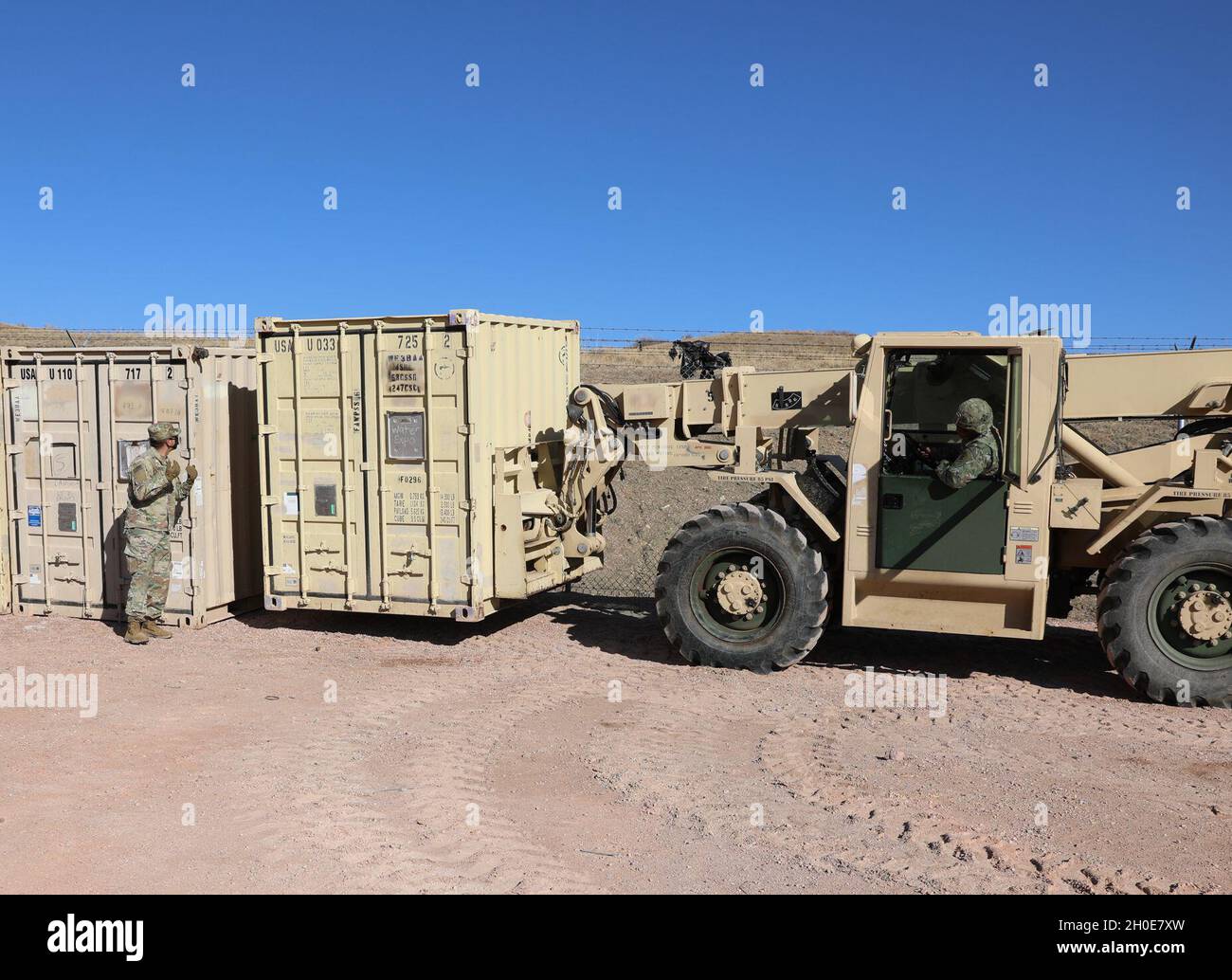 Bakersfield, California native Spc. Armando Aguirre, (left), ground ...