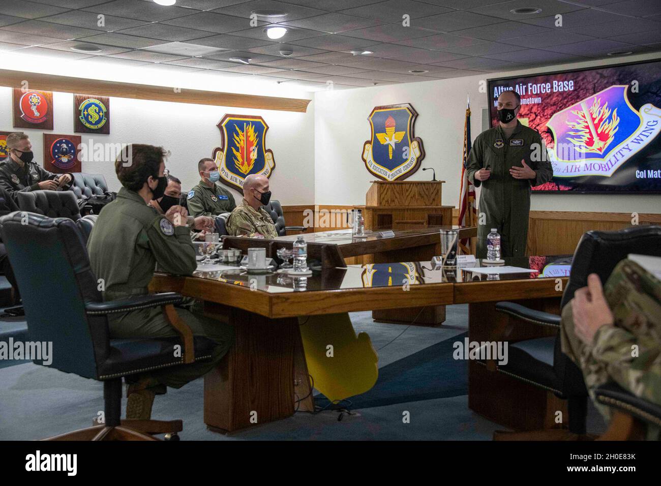 Col. Matthew Leard, 97th Air Mobility Wing commander, gives the wing ...