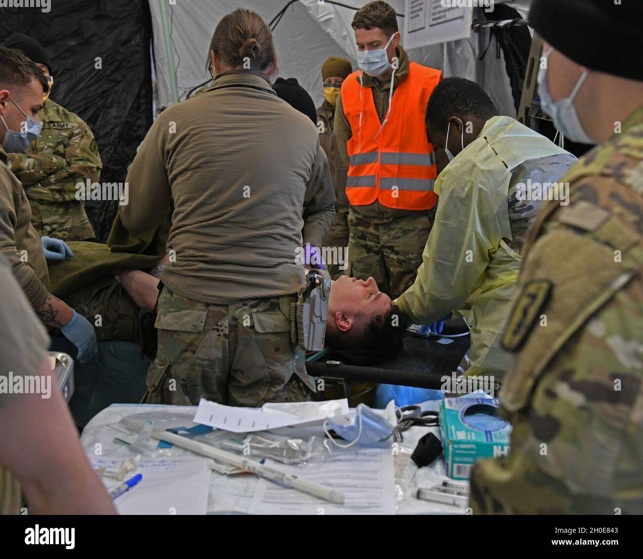Medicals of the 512th Field Hospital render first aid of a simulated ...