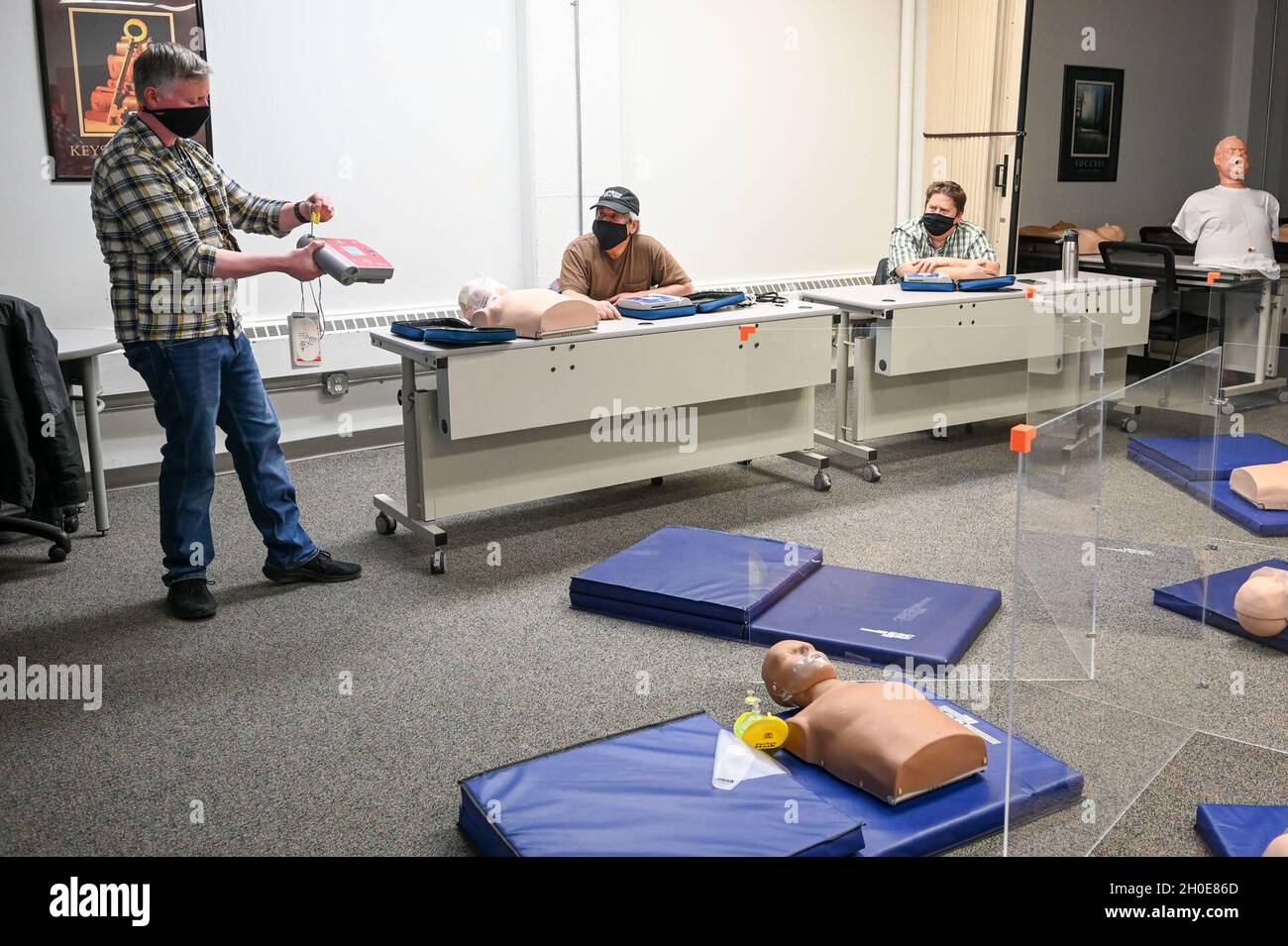 Instructor Jason Bertoldie, 75th Force Support Squadron, demonstrates ...