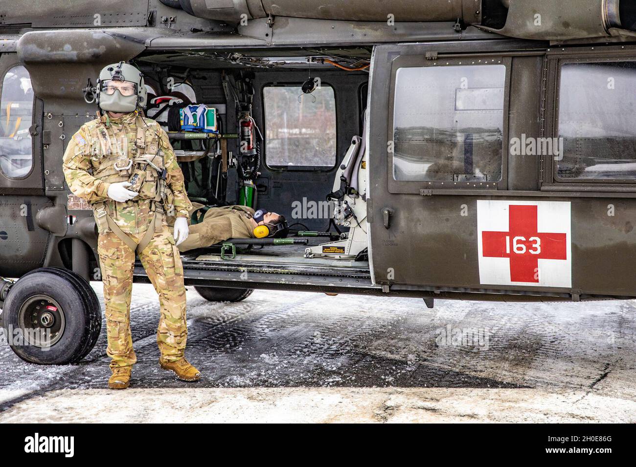 U.S. Army Sgt. Derek Born, a flight paramedic assigned to Charlie ...