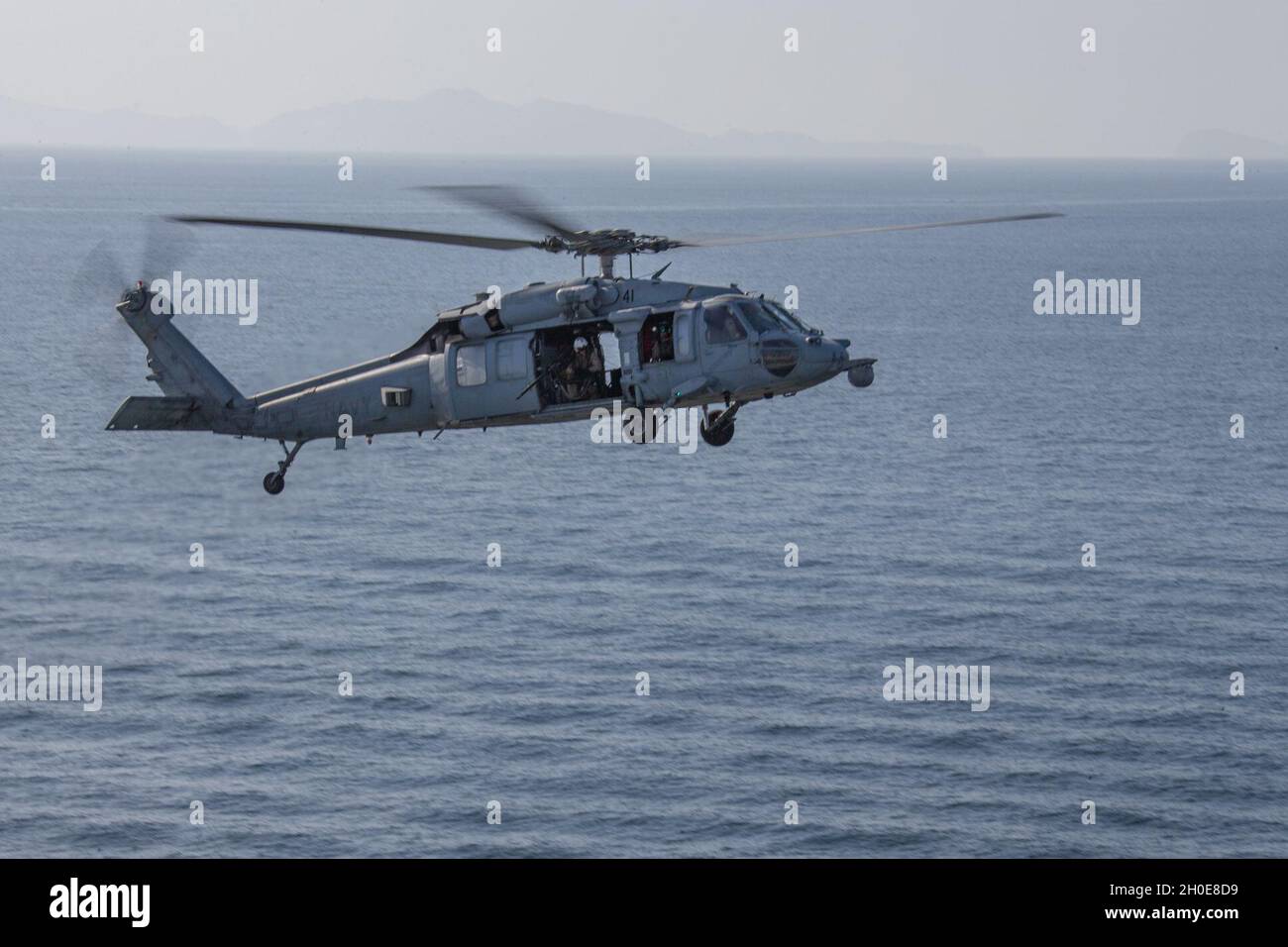 A U.S. Navy MH-60S Sea Hawk assigned to Helicopter Maritime Strike ...