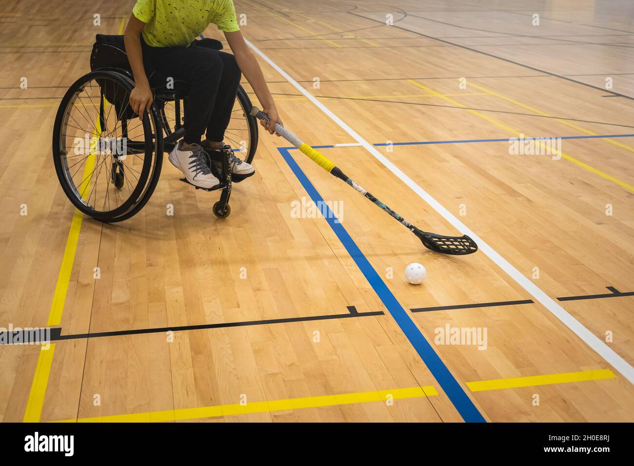 Athlete with disability playing wheelchair hockey with stick Stock ...