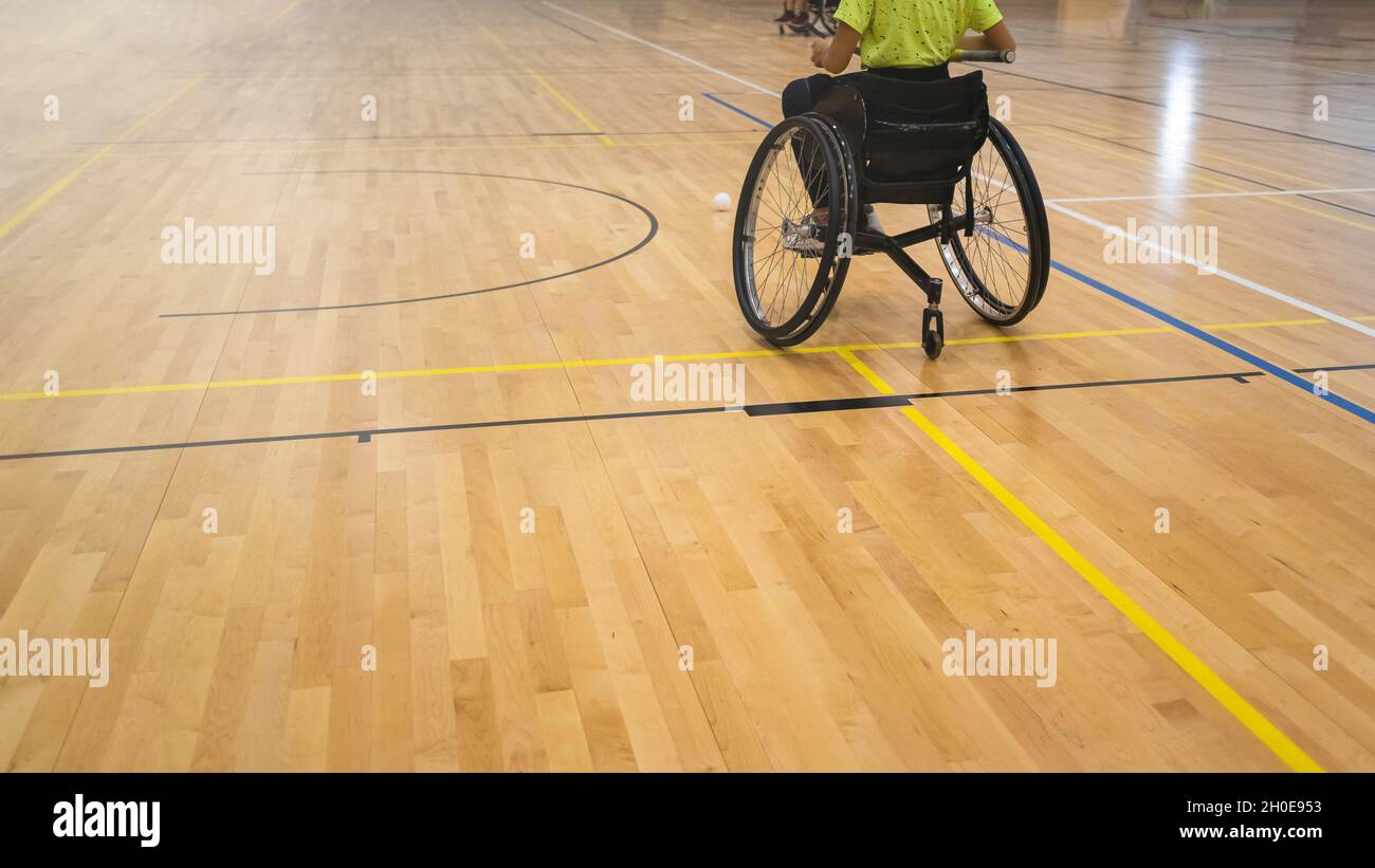 Athlete with disability playing wheelchair hockey with stick Stock ...