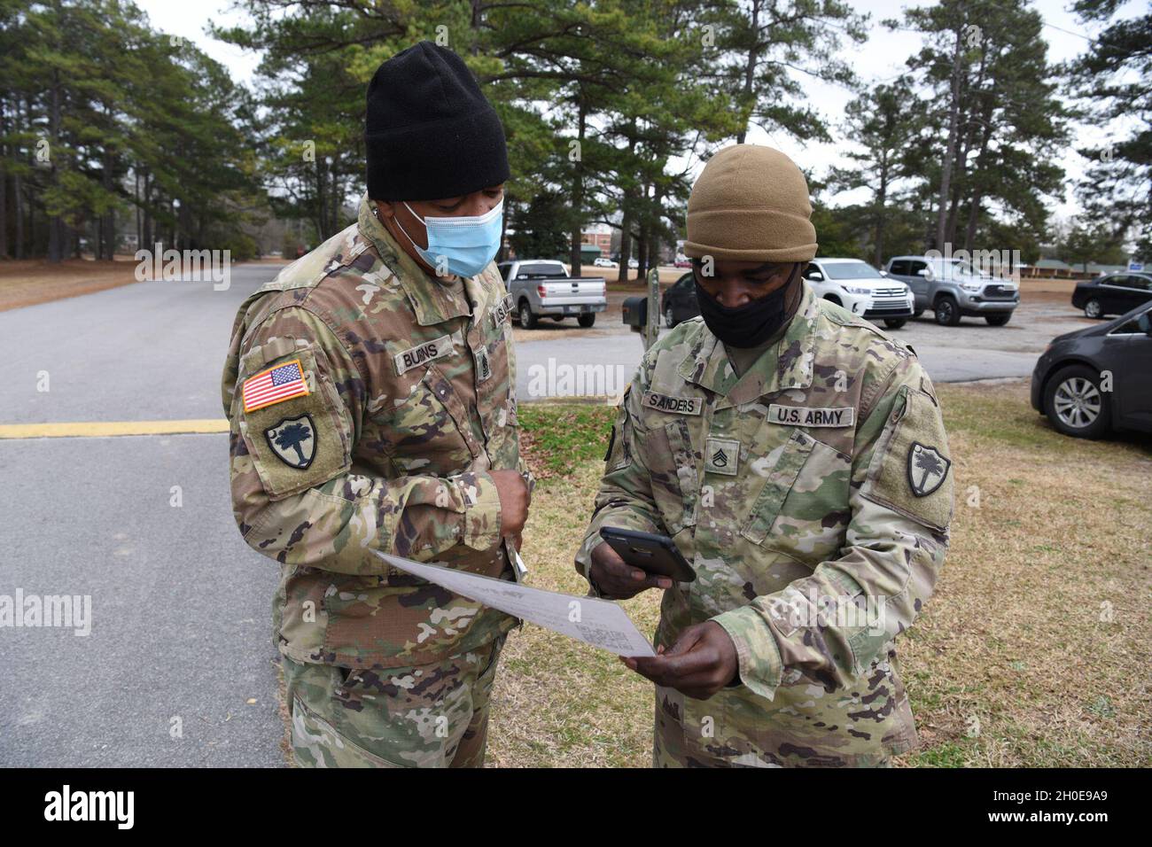 U.S. Army 1st Sgt. Warren Burns and Staff Sgt. Zackarie Sanders, both ...