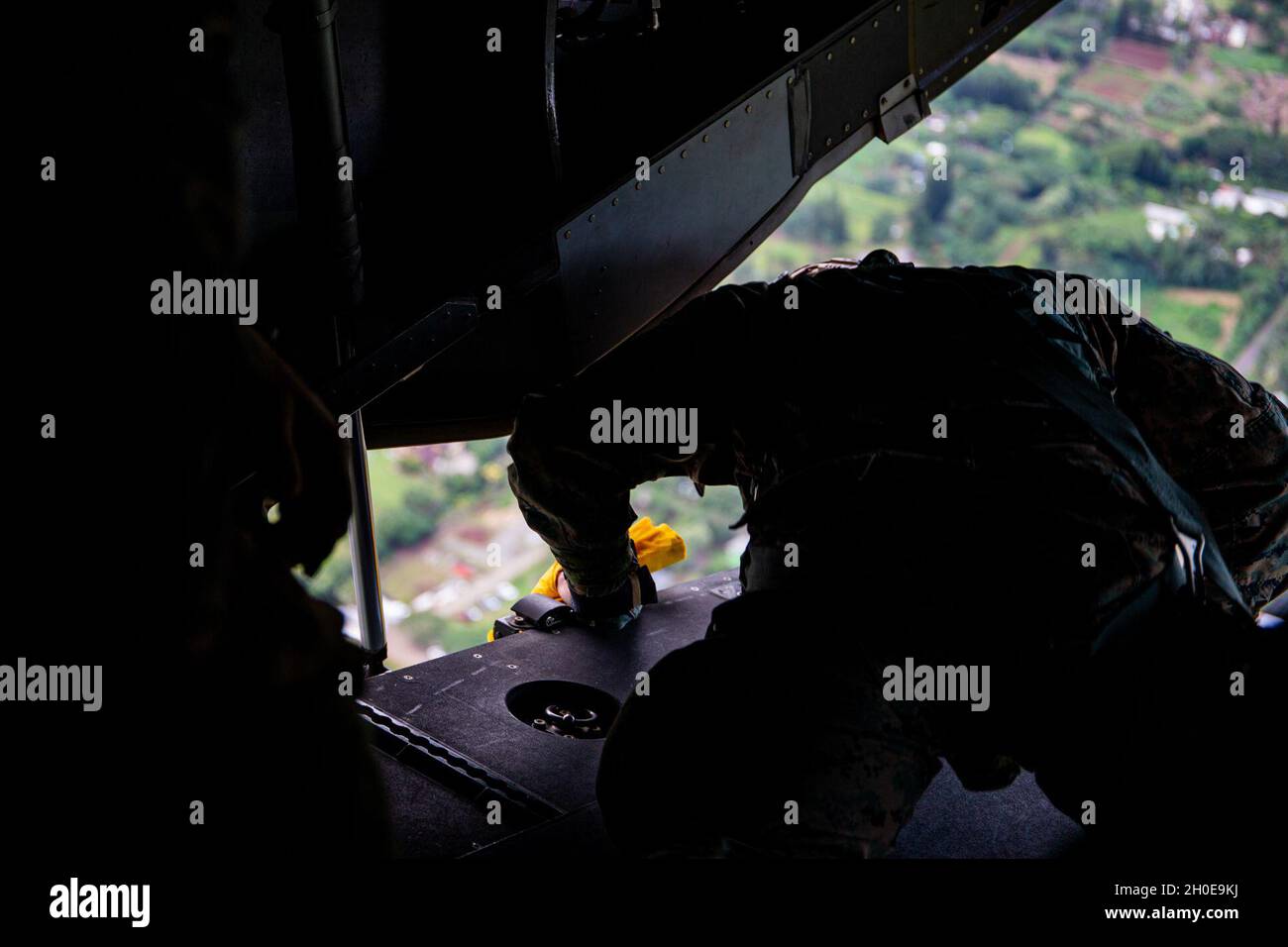 U.S. Marine Corps Sgt. Marcus Auge, an airborne delivery specialist ...
