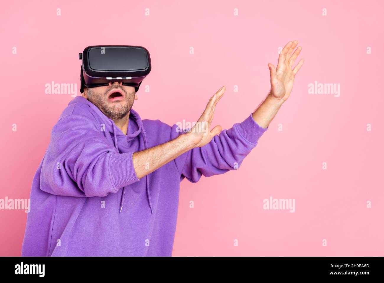 Photo of young scared guy play game simulation horror fear fantasy ...