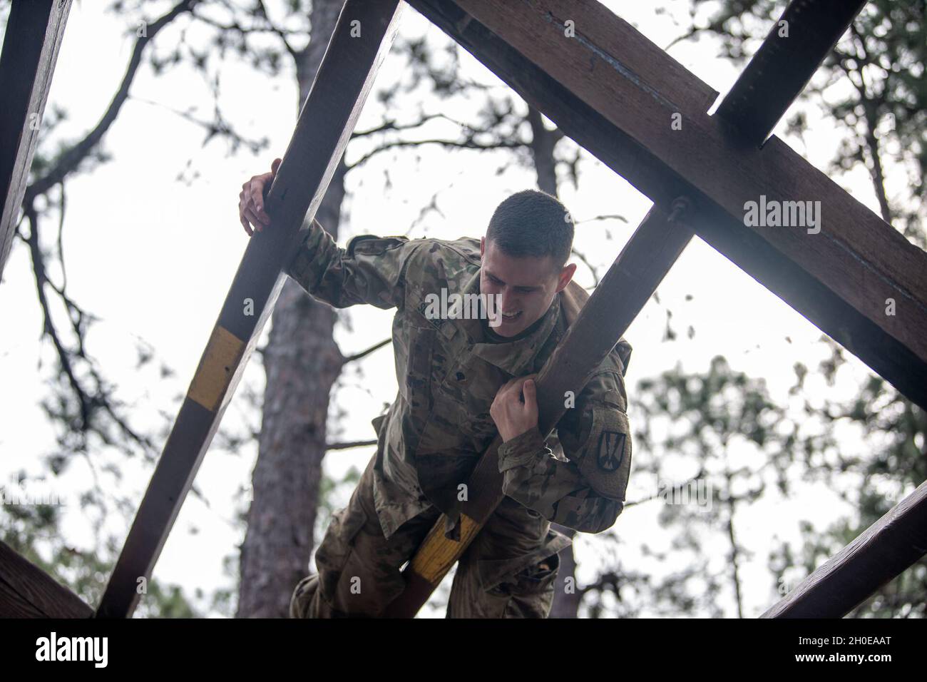 Spc. Noah Sladek, 2nd Battalion, 39th Infantry Regiment, navigates an ...