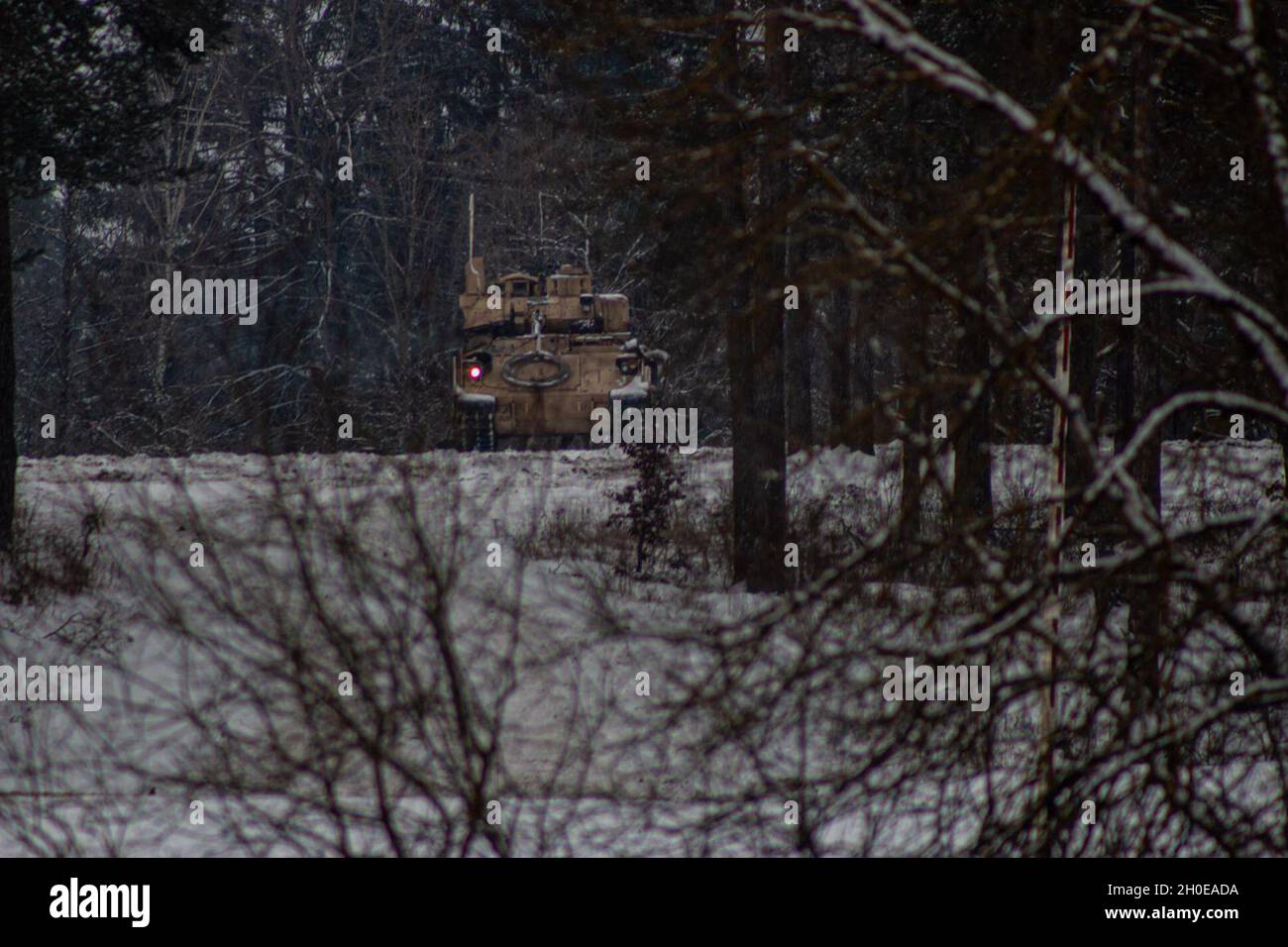 A Bradley from 1st Squadron 7th Cavalry Regiment reconnoiters an ...