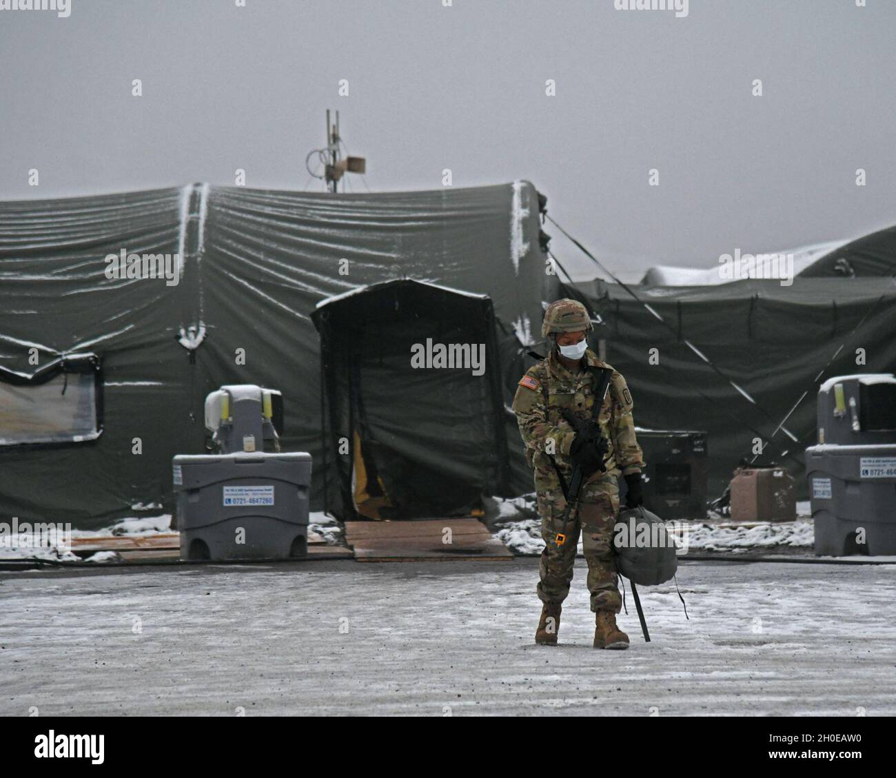 Spc. Brittney Jones with the 512th Field Hospital, walks in the first ...