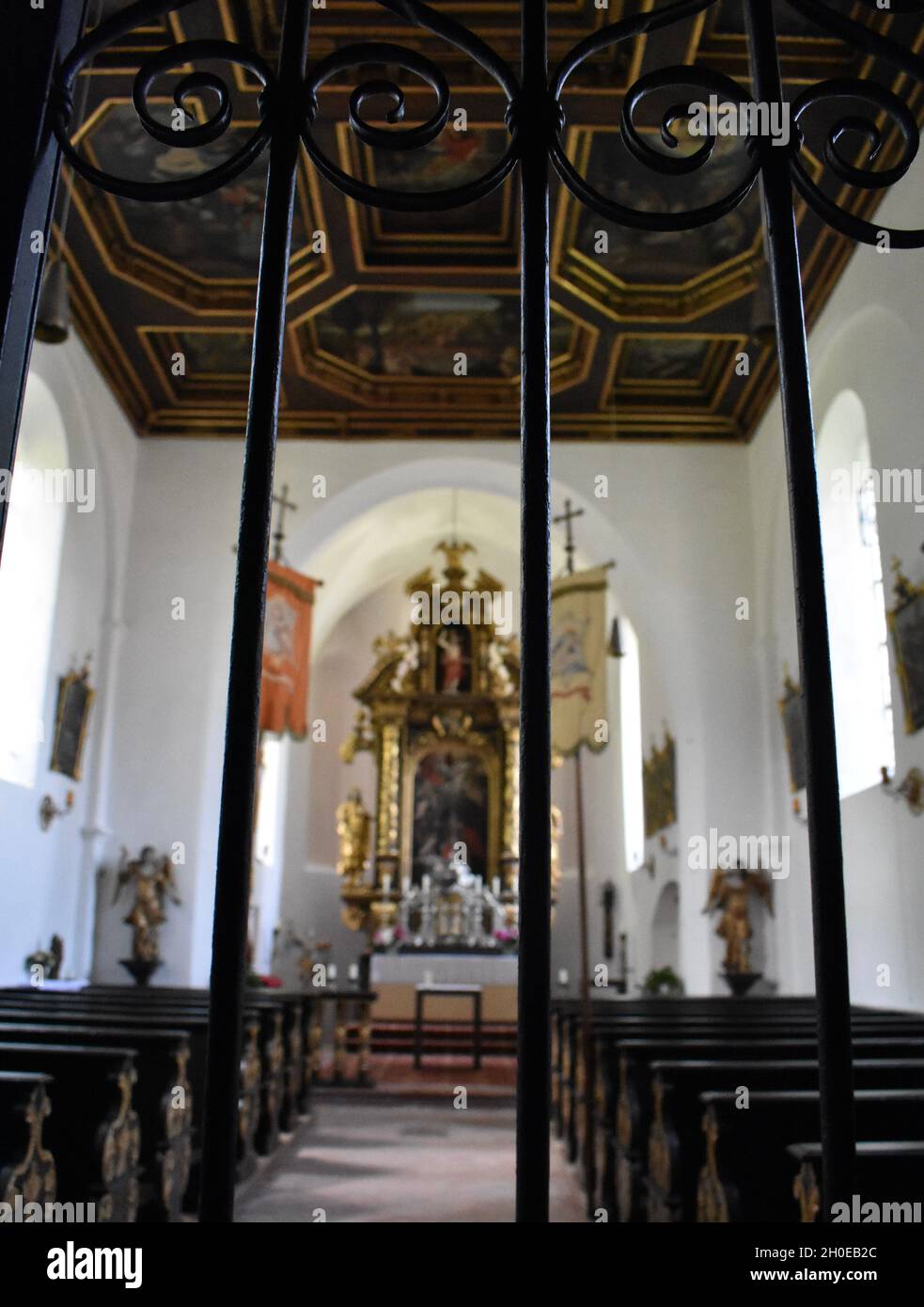 Church through bars Stock Photo - Alamy