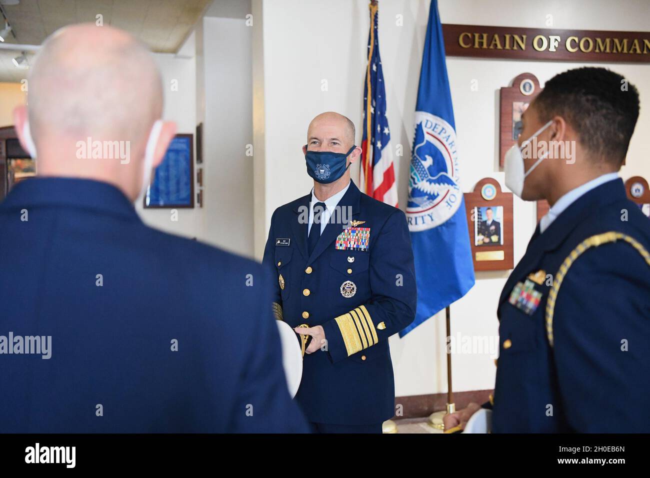 Adm. Charles Ray, the Vice Commandant of the U.S. Coast Guard presents ...