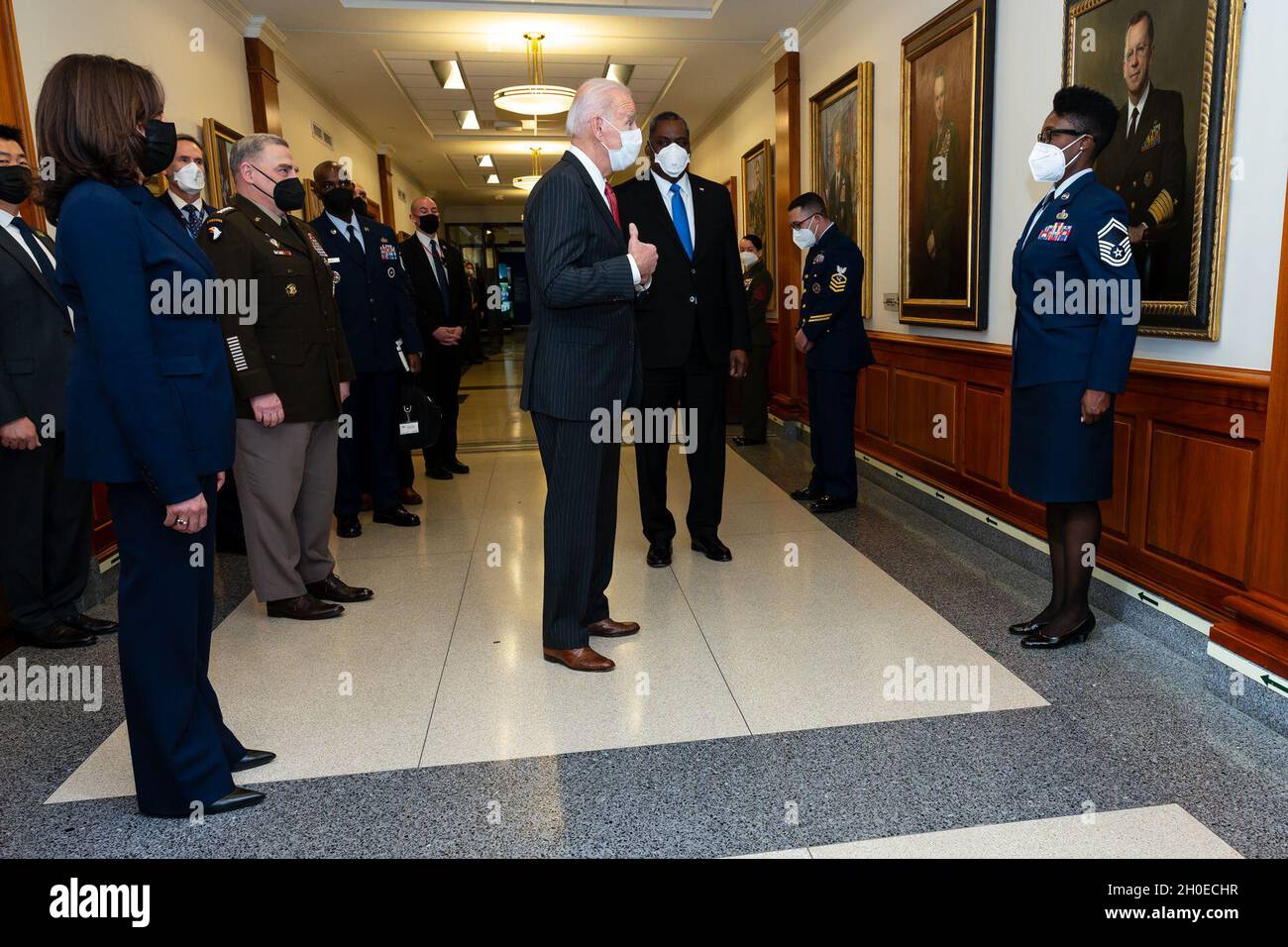 President Joe Biden greets Air Force Senior Master Sgt. Ebony Sanders ...