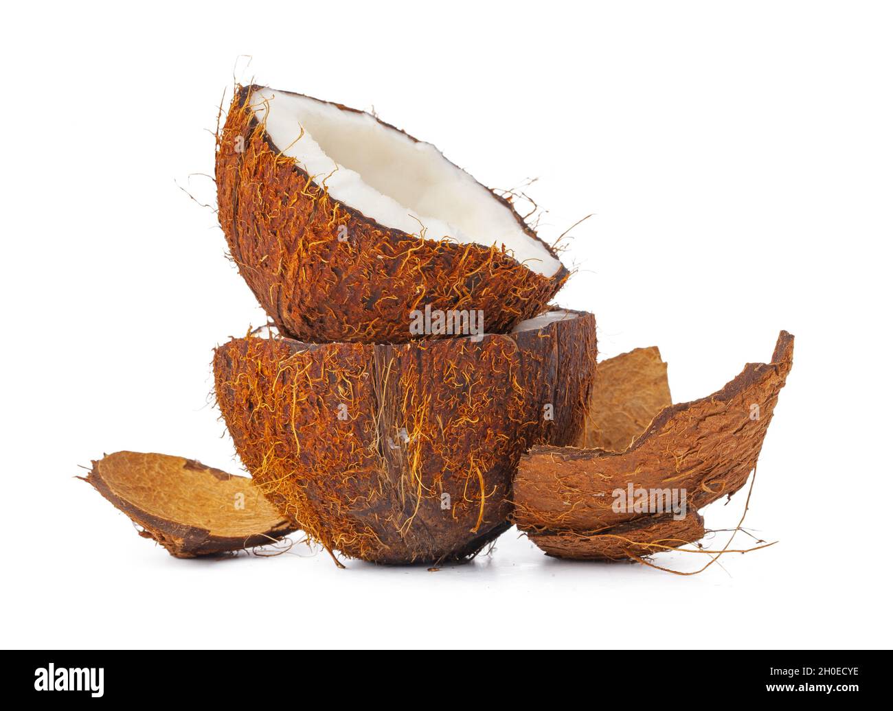 Coconut pieces pile isolated on white background Stock Photo - Alamy
