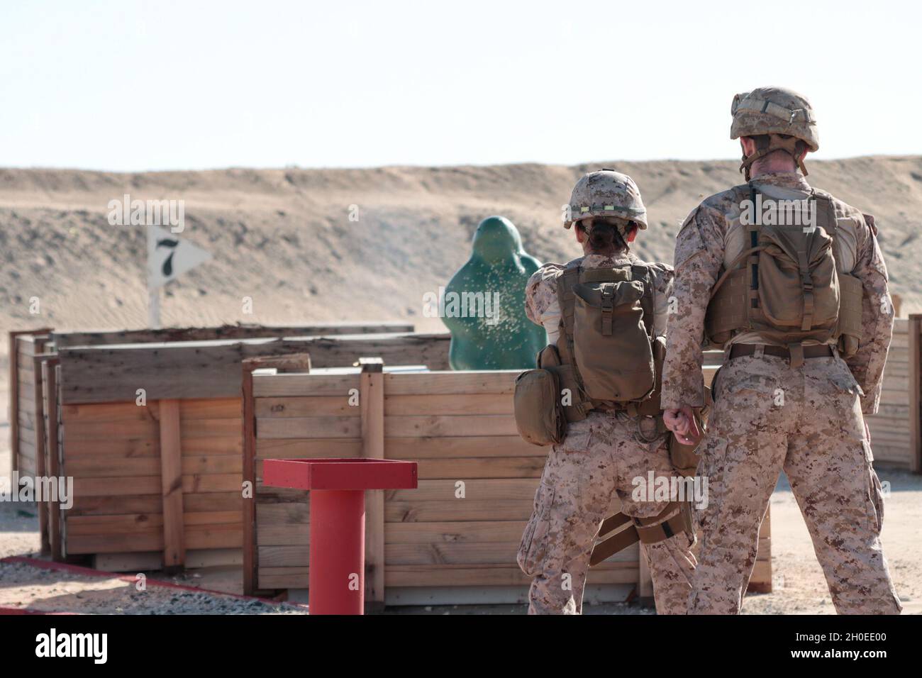 U.S. Marine Corps Sgt. Angeline Prakelt, left, a wrecker operator and ...