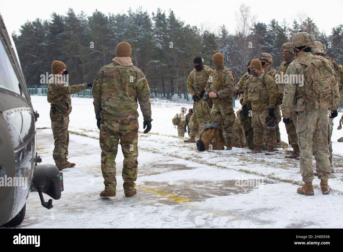U.S. Army Soldiers teach a class outdoors at Camp Albertshof in ...