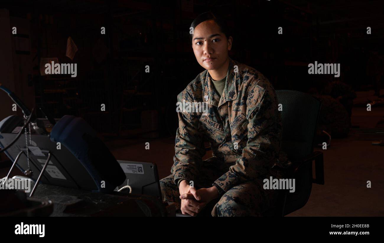 U.S. Marine Corps Sgt. Angelica J. Angeles, a satellite transmissions ...