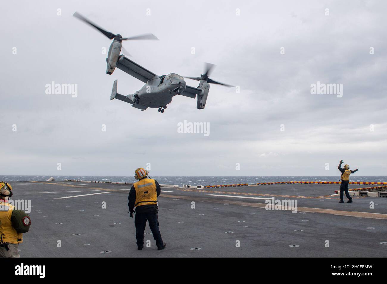 210211-N-NJ919-1390 EAST CHINA SEA (Feb. 11, 2021) Sailors assigned to ...