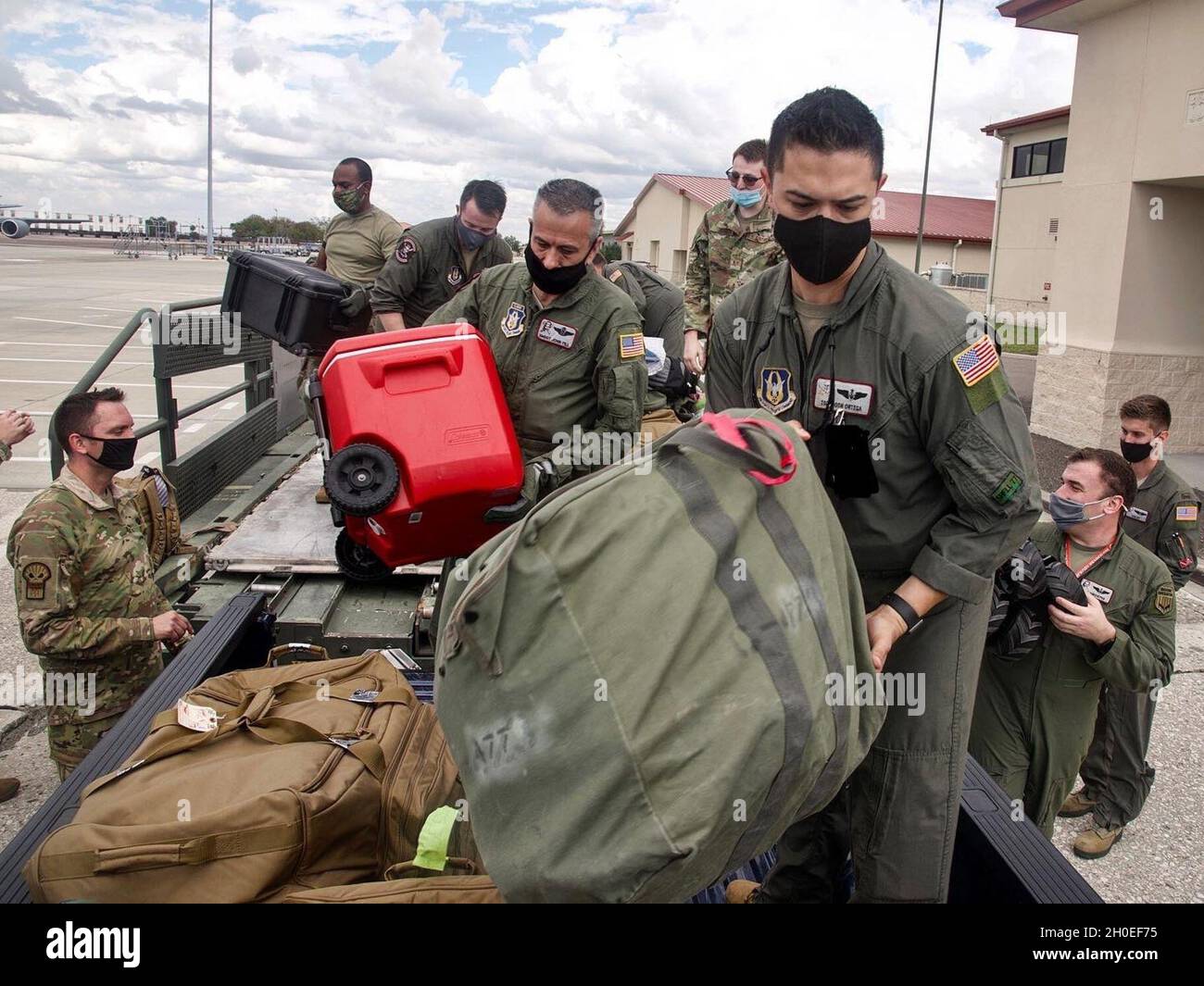 U.S. Air Force pilots and boom operators, with the 63rd Air Refueling ...