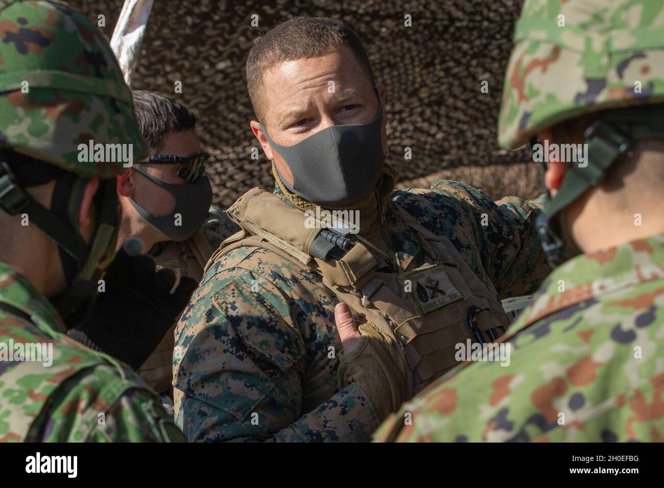 U.S. Marine Corps Staff Sgt. Brandon Hendrix, assigned to 3d Battalion ...