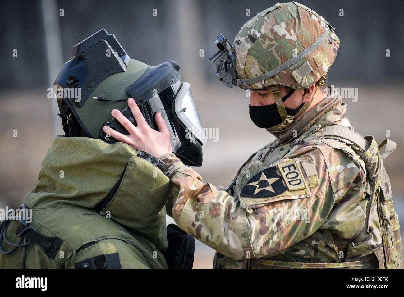 CAMP HUMPHREYS, Republic of Korea - Pfc. Eee-Jay Rodriguez, right, an explosive ordnance ...