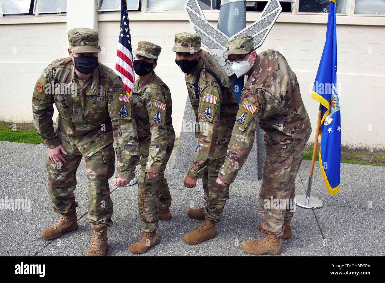 Former Air Force Staff Sgts. James Taylor (third from the left) and ...