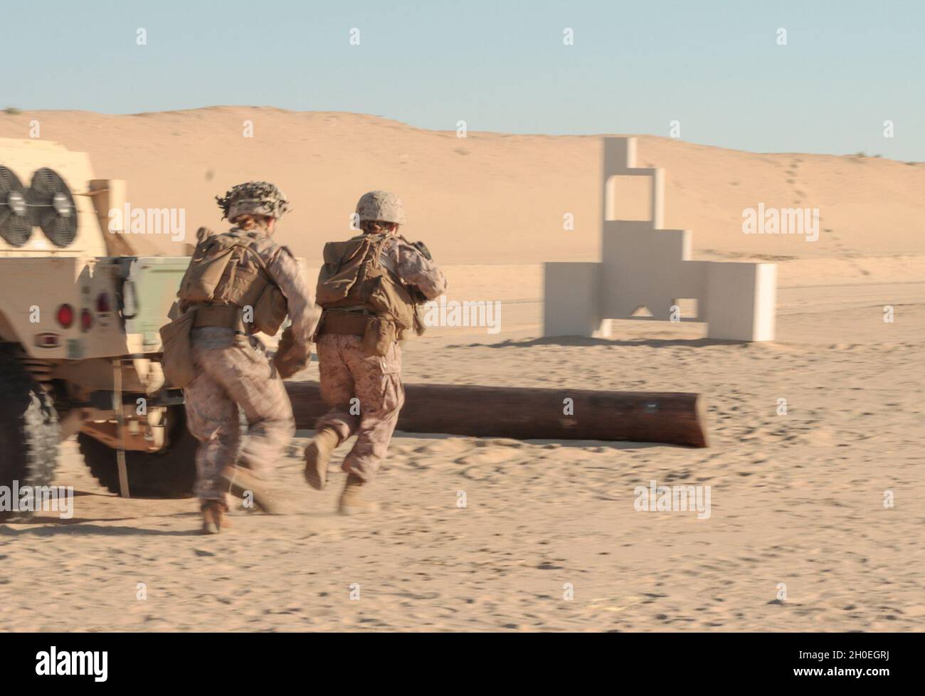 U.S. Marine Corps 1st Lt. Jessica Meisinger, left, a field artillery ...