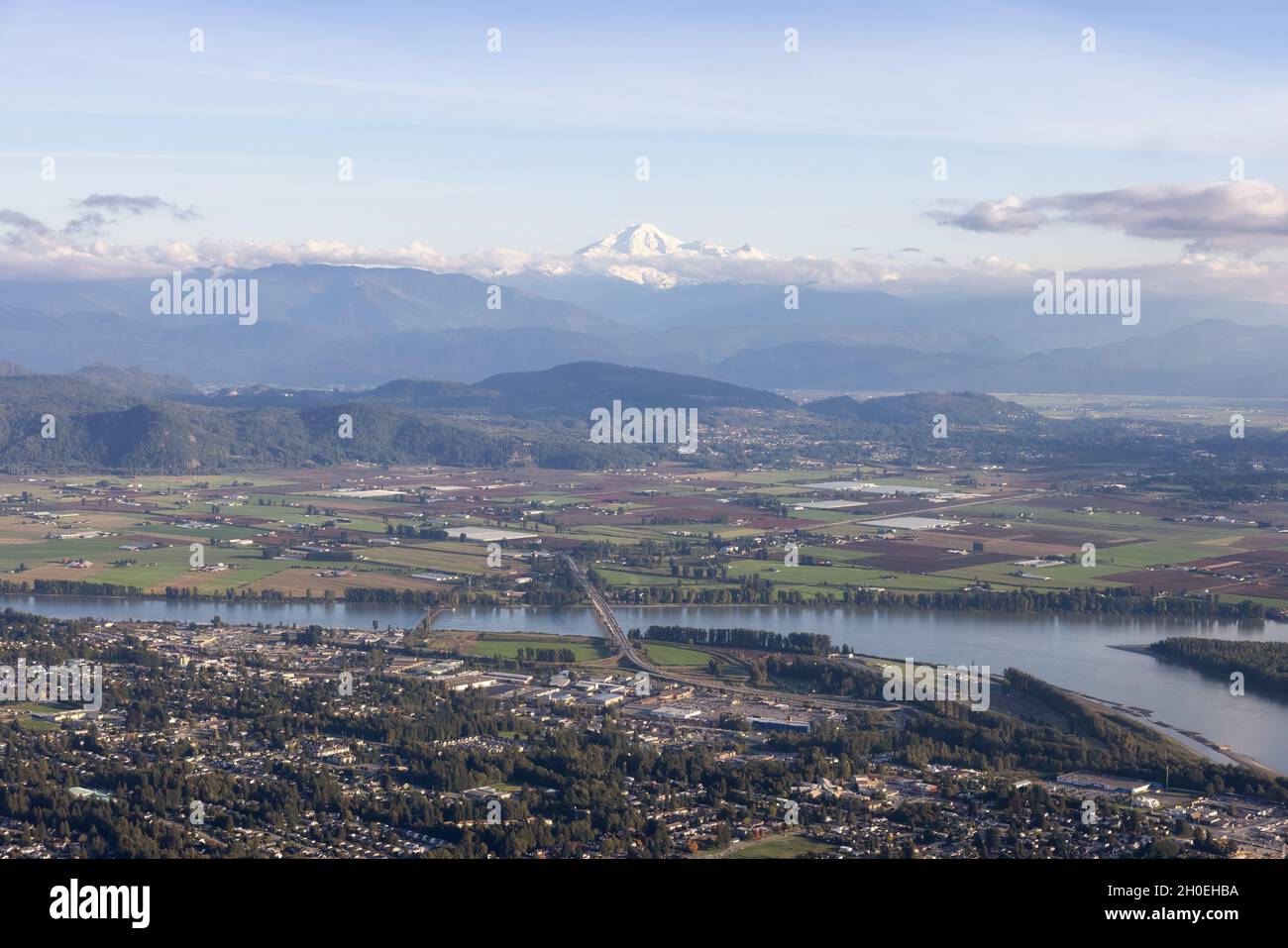 Aerial View of Mission City, Fraser River and Mnt Baker in background ...