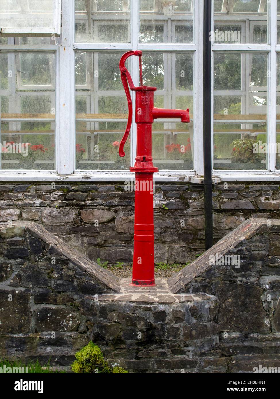 Old red water pump at Vandeleur Gardens in Kilrush County Clare Ireland ...