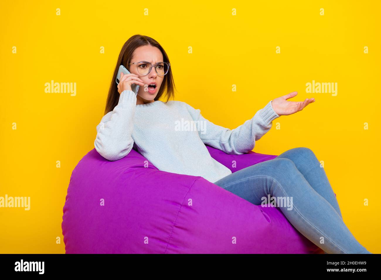 Photo of unhappy upset mad woman sit chair hold phone talk problem ...