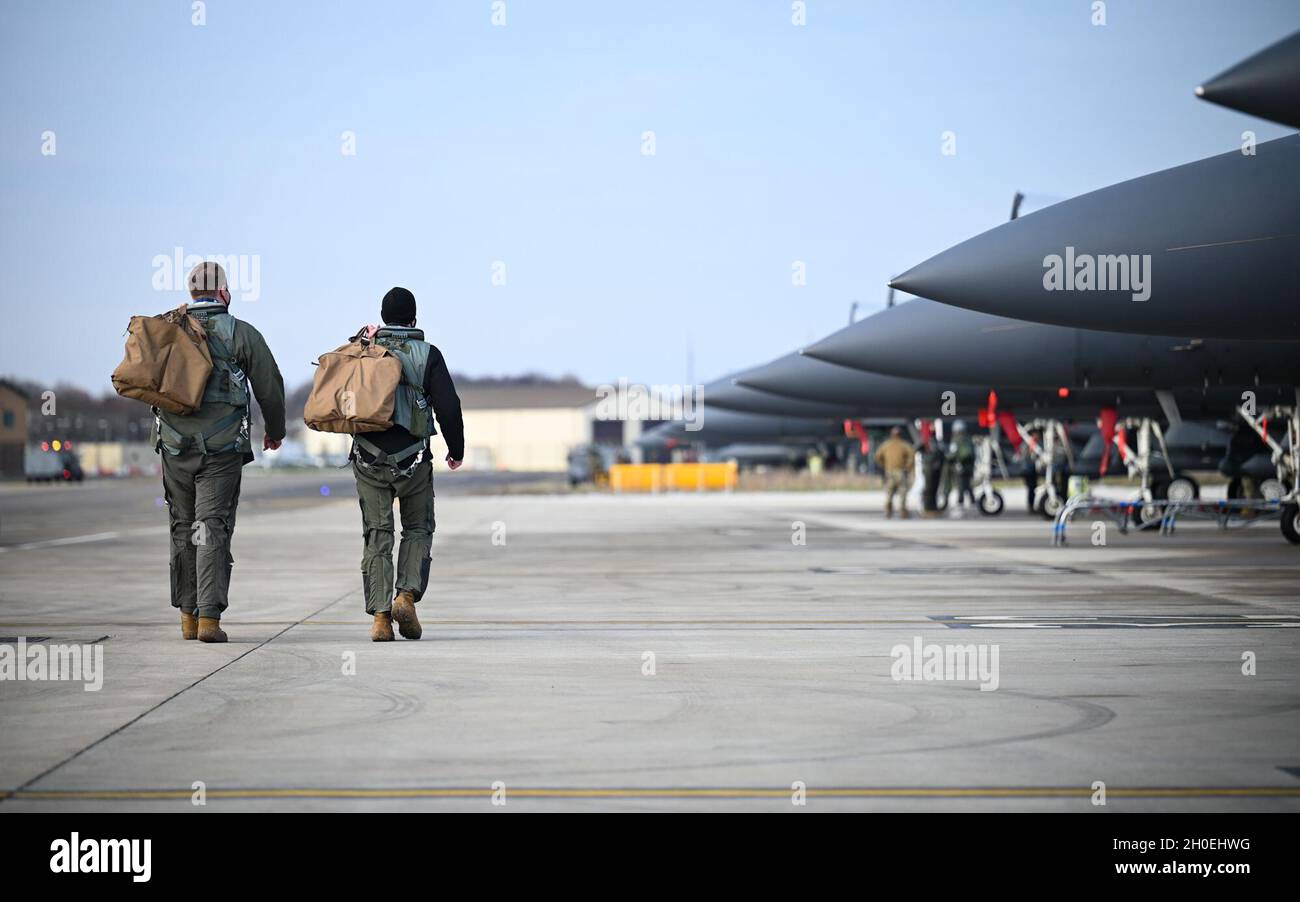 Pilots assigned to the 492nd Fighter Squadron step out to an F-15E ...