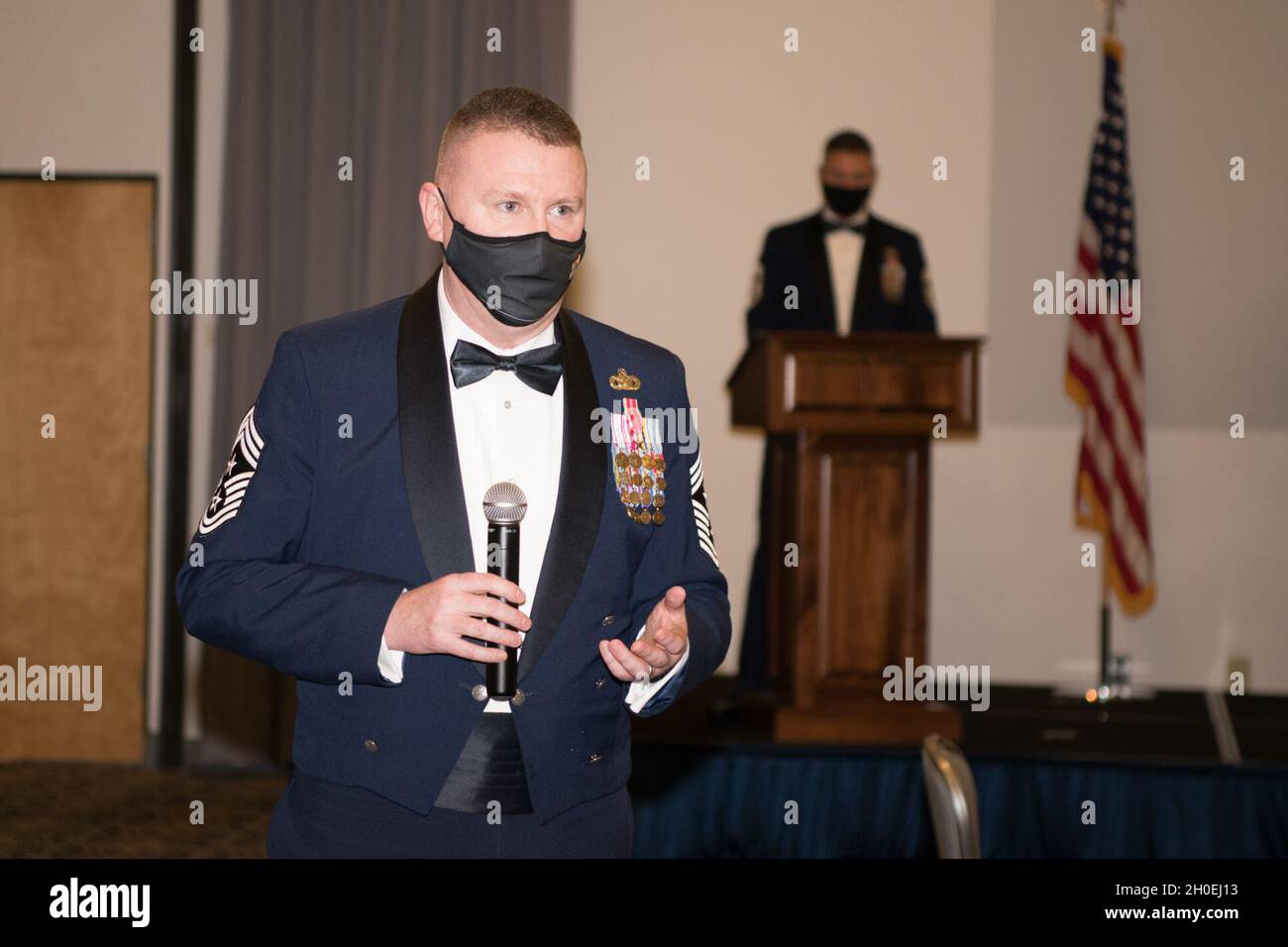 Chief Master Sgt. Chad Bickley, 18th Air Force command chief, gives a ...