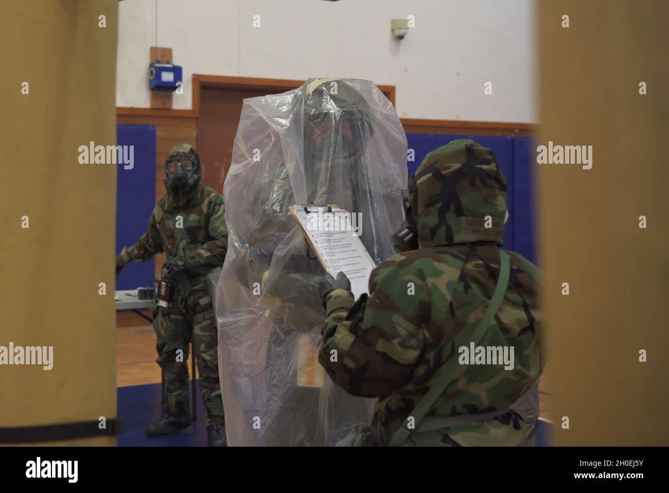 U.S. Air Force service members practice the proper removal Mission ...