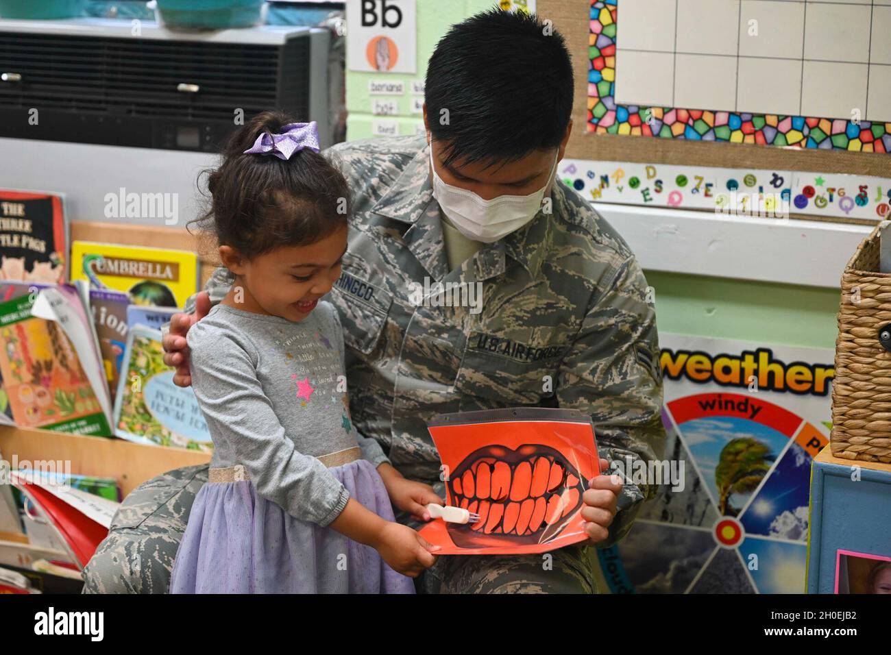 U.S. Air Force Airman 1st Class James Tychingco, a dental assistant ...