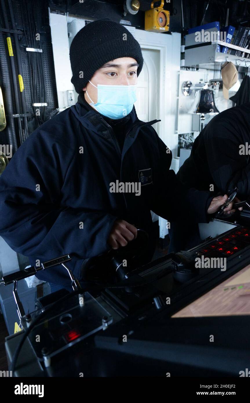 210212-N-CF707-1001 PACIFIC OCEAN (Feb. 12, 2021) Seaman Alex Fernandez ...