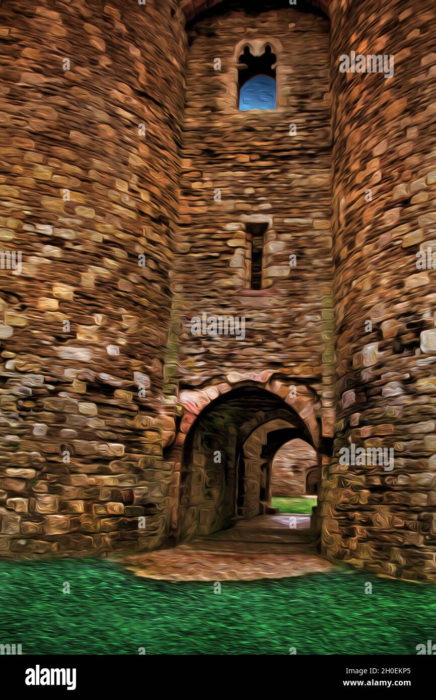 Entrance gateway with stone walls and towers on the front facade of ...