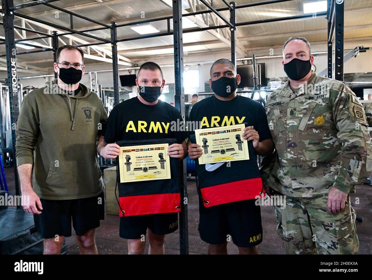 From left, U.S. Army Lt. Col. James Snowden, 1st Sgt. David Henderson ...