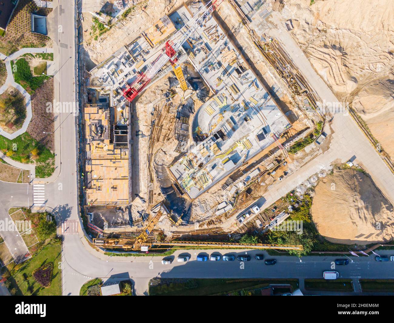 Residential building under construction. Cranes and other construction ...