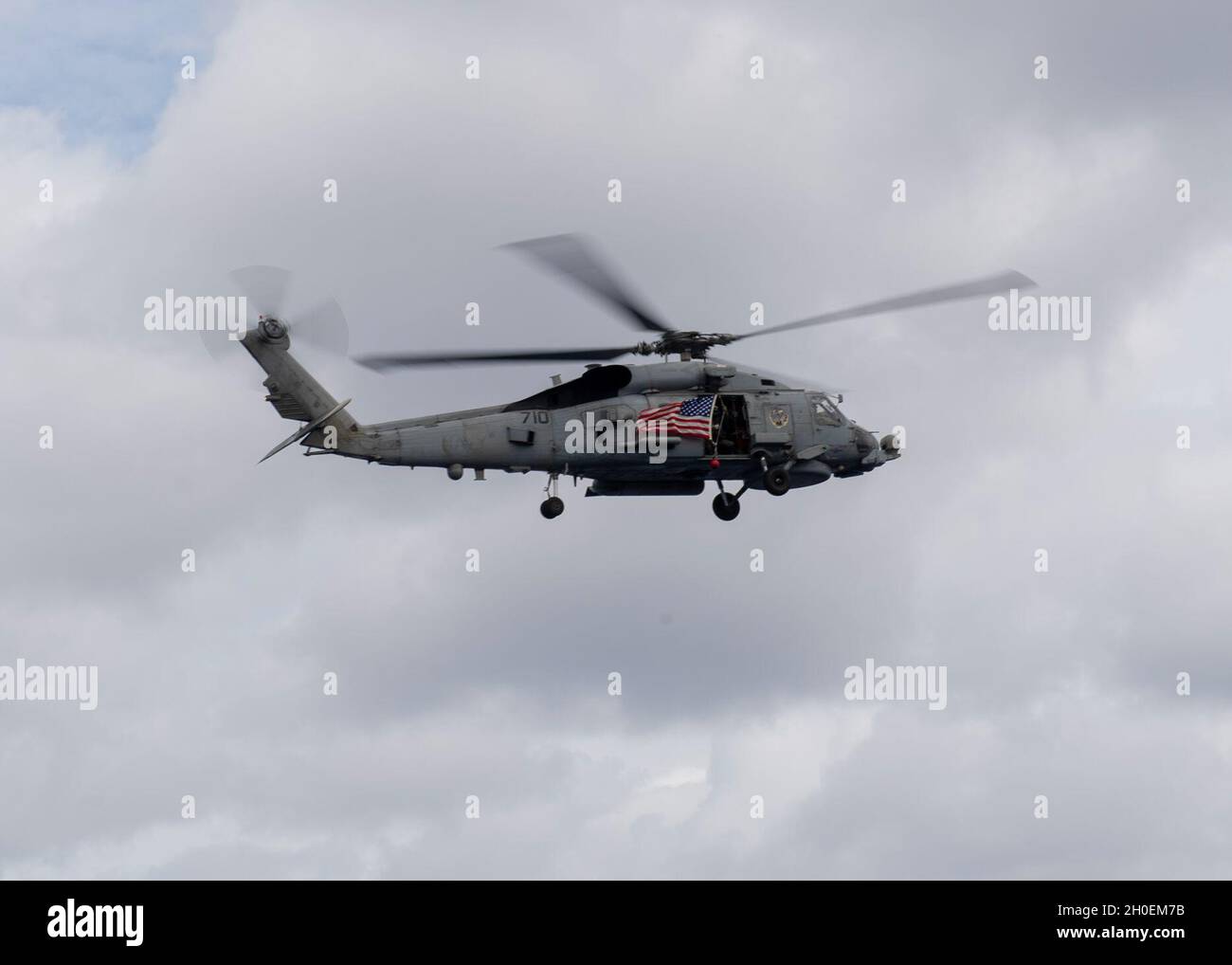 210215-N-KO930-1101 PACIFIC OCEAN (Feb. 15, 2021) An MH-60R Sea Hawk ...