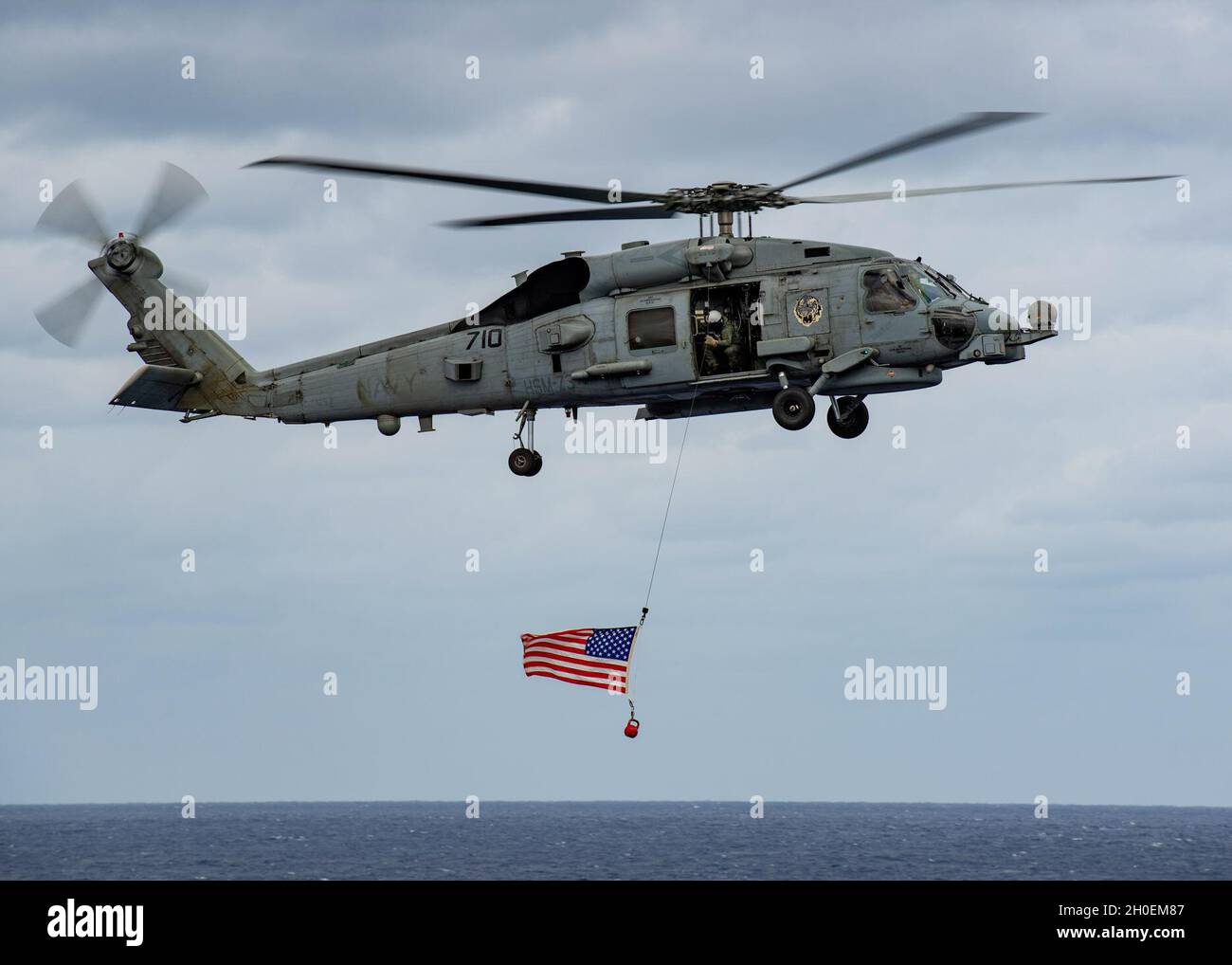 210215-N-NH257-1047 PACIFIC OCEAN (Feb. 15, 2021) An MH-60R Sea Hawk ...