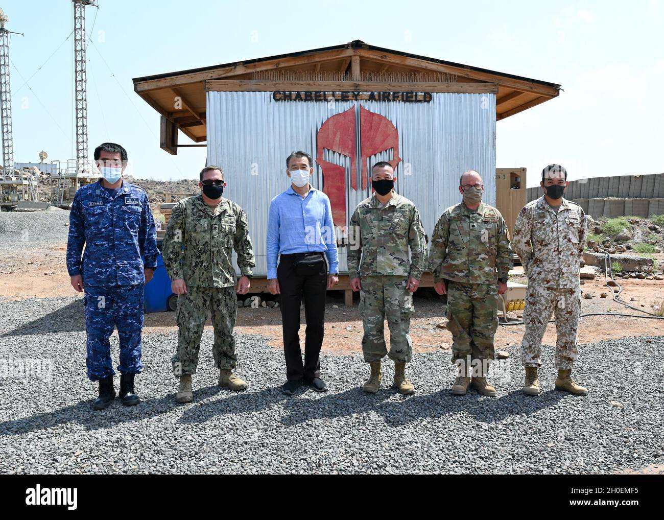 From left, Japanese Navy CDR Kenichi Yamashita, U.S. Navy Command ...